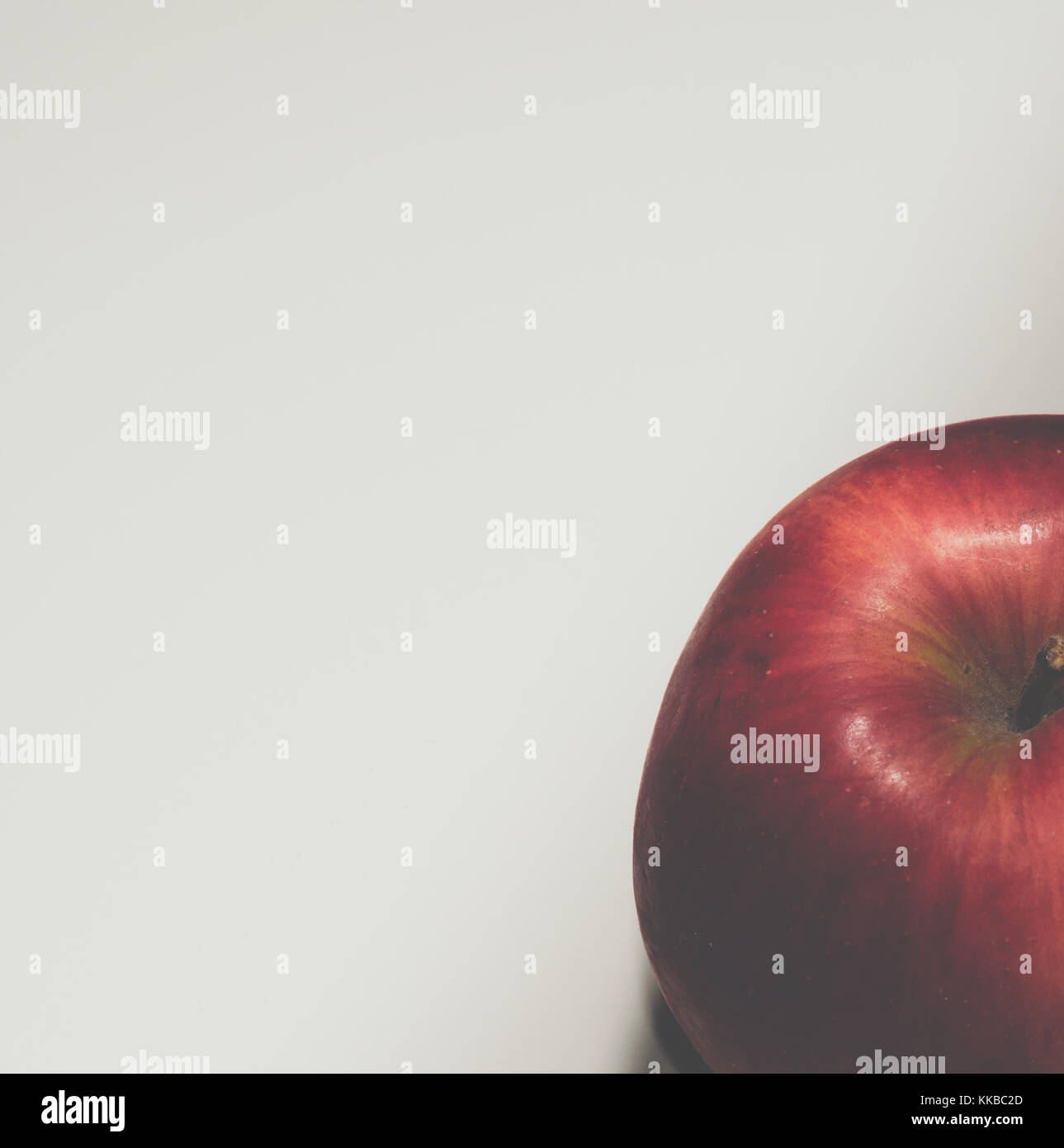 Red apple on a white background top view Stock Photo - Alamy