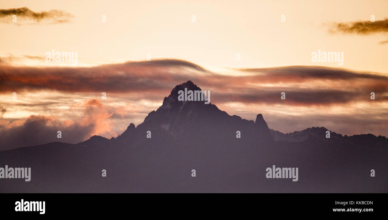 view of Mount Kenya, dark sunrise from a distance, wide format, from ...