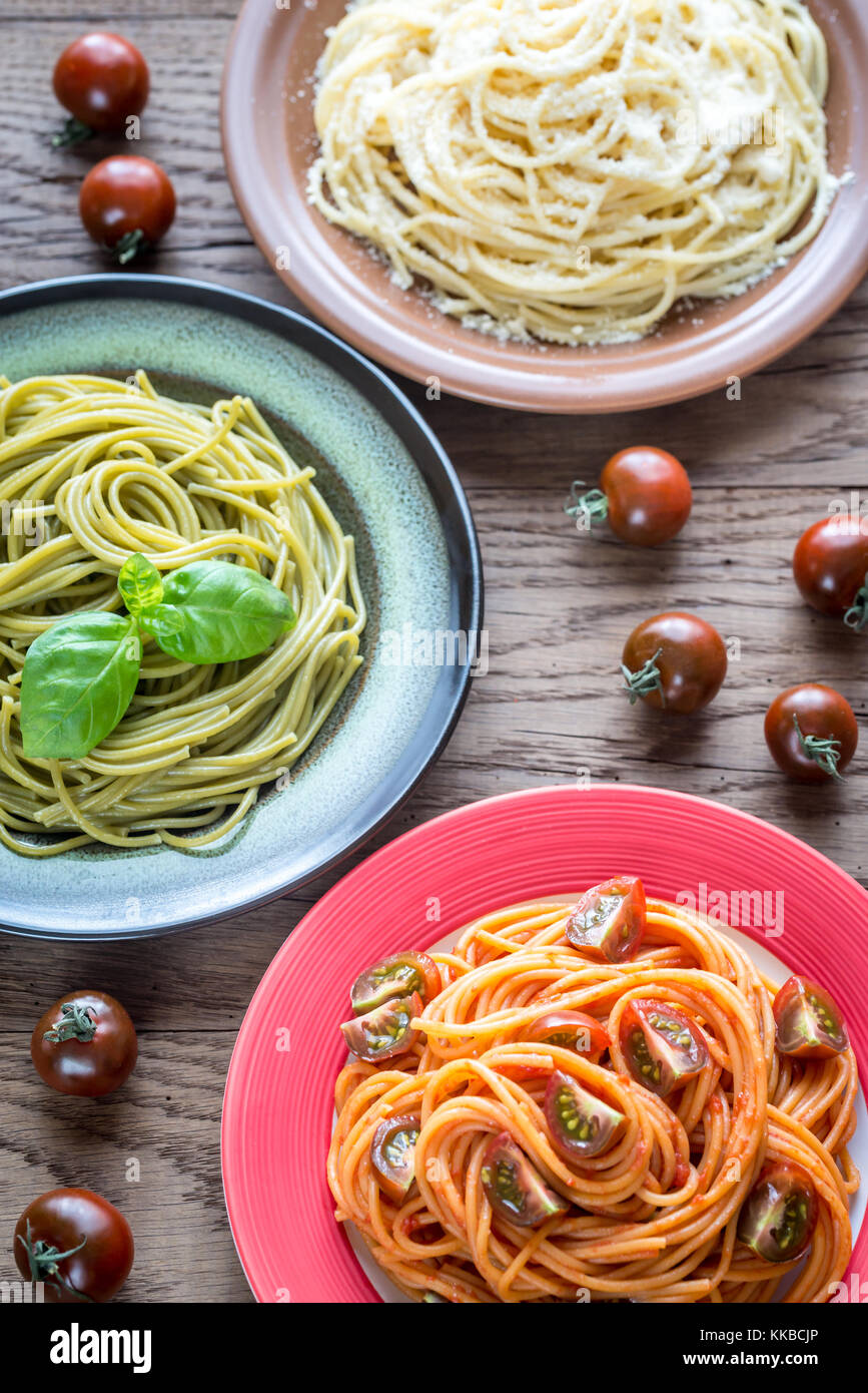 Portions of colorful spaghetti with ingredients Stock Photo - Alamy