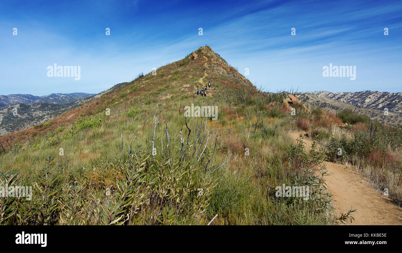 People going up the winding path he Blue Ridge trail at the Stebbins ...