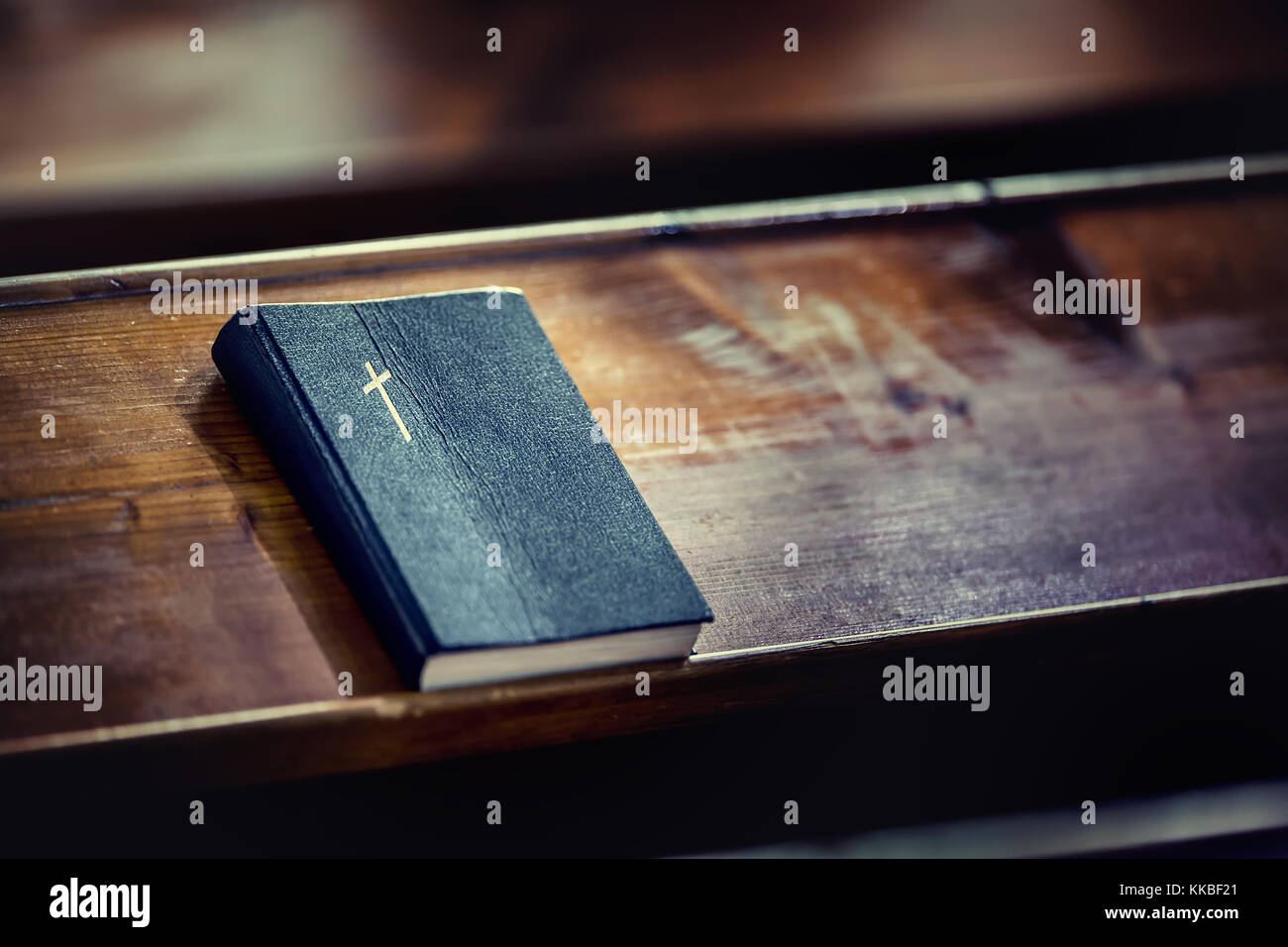 Book holy bible. Holy Bible on old wooden church table Stock Photo - Alamy