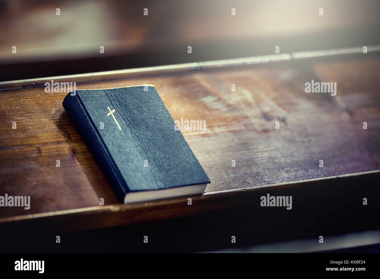 Book holy bible. Holy Bible on old wooden church table Stock Photo - Alamy