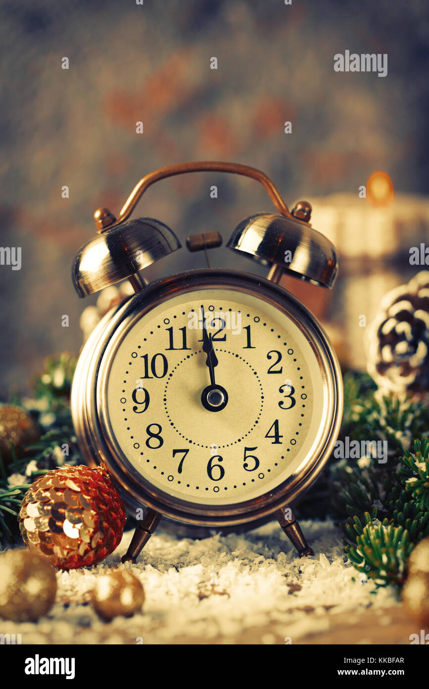 Christmas countdown to the new year. Clock and balls and fir spruce ...