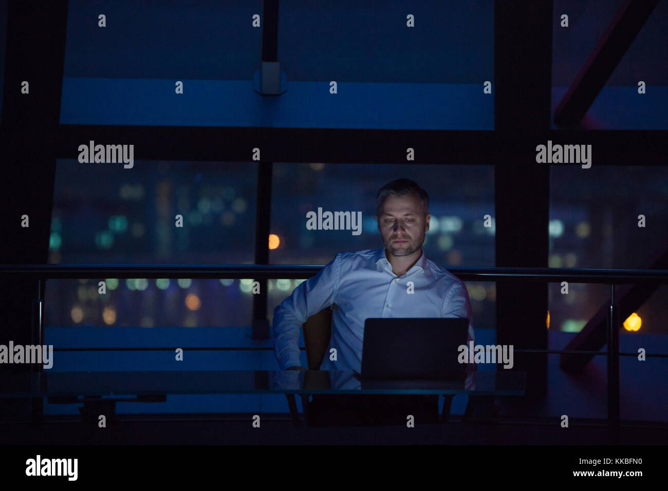 Office night businessman thinking hi-res stock photography and images ...