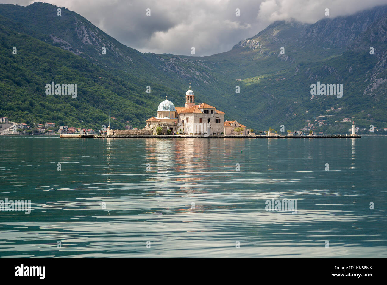 Our Lady of the Rocks church taken from a boat sailing in the Bay of ...