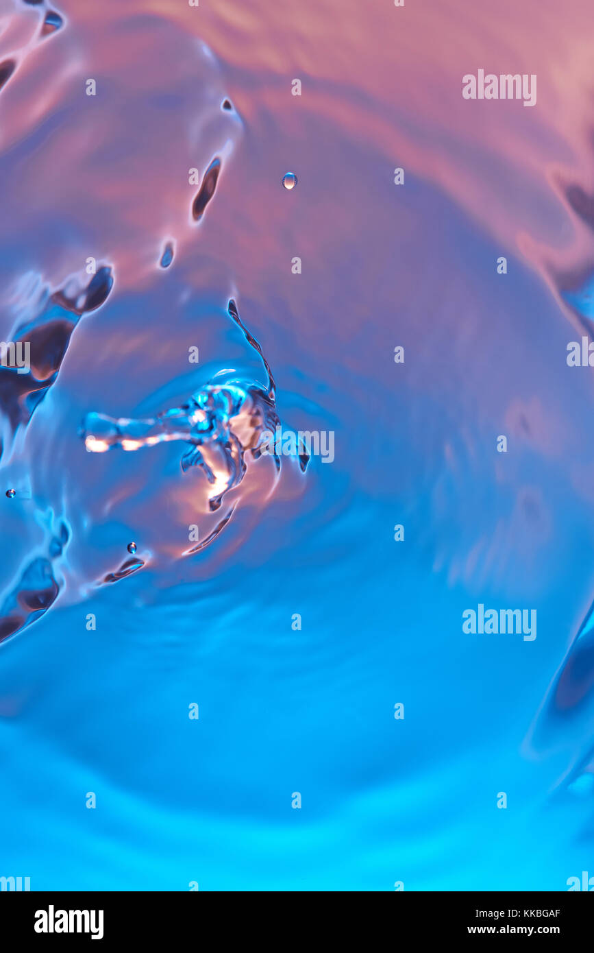 Abstract curved colrful water background surface. Water splash view ...