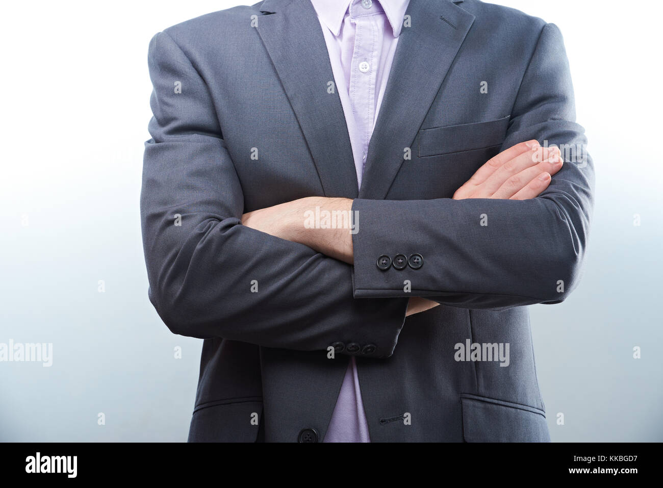 Crossed arms of businessman closeup isolated on white background Stock ...