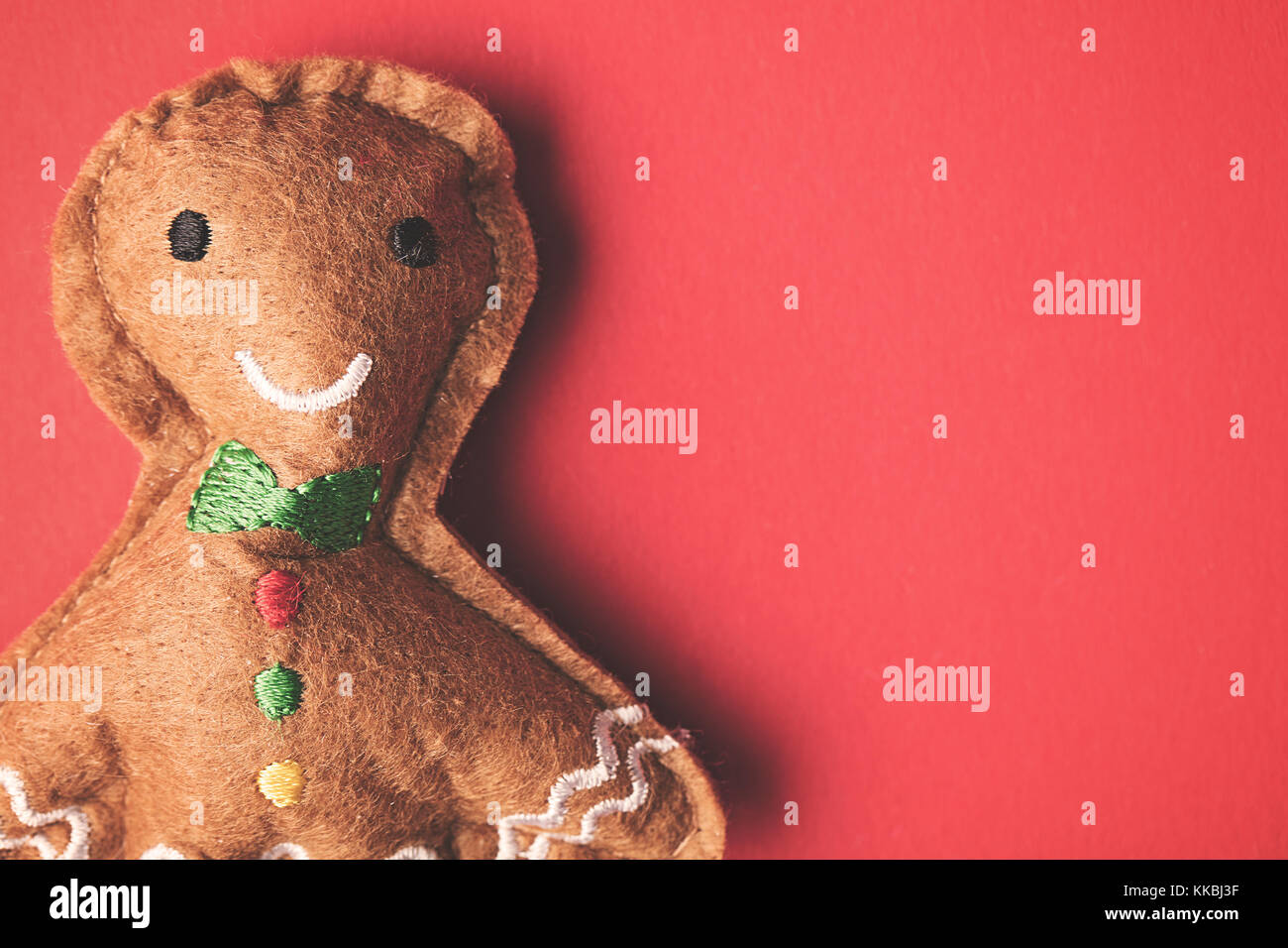 Christmas gingerbread man decoration on a red background Stock Photo ...