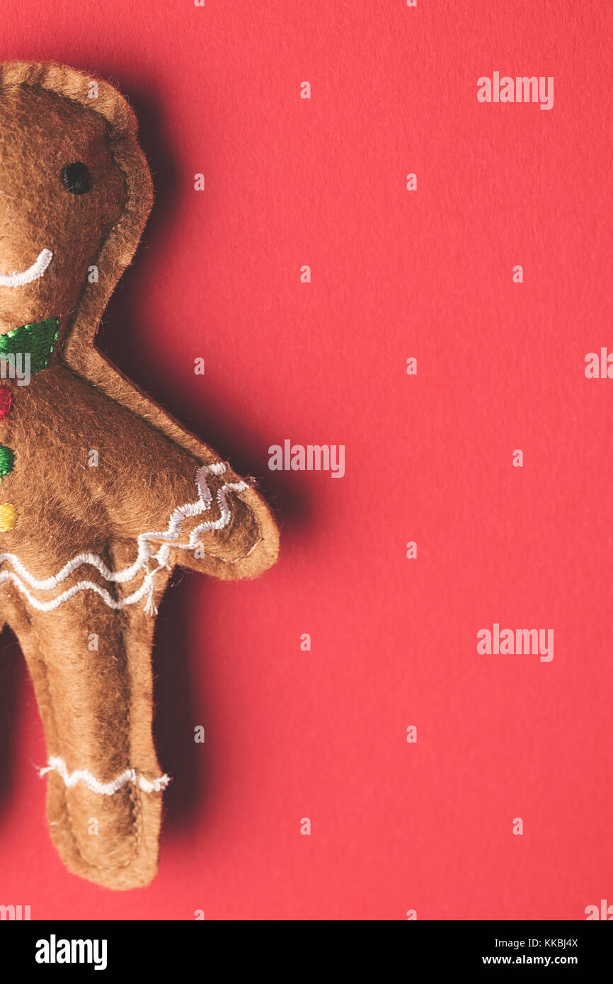 Christmas gingerbread man decoration on a red background Stock Photo ...