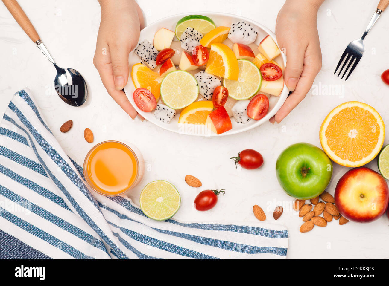 Fresh mixed fruit salad in bowl of salad Stock Photo - Alamy