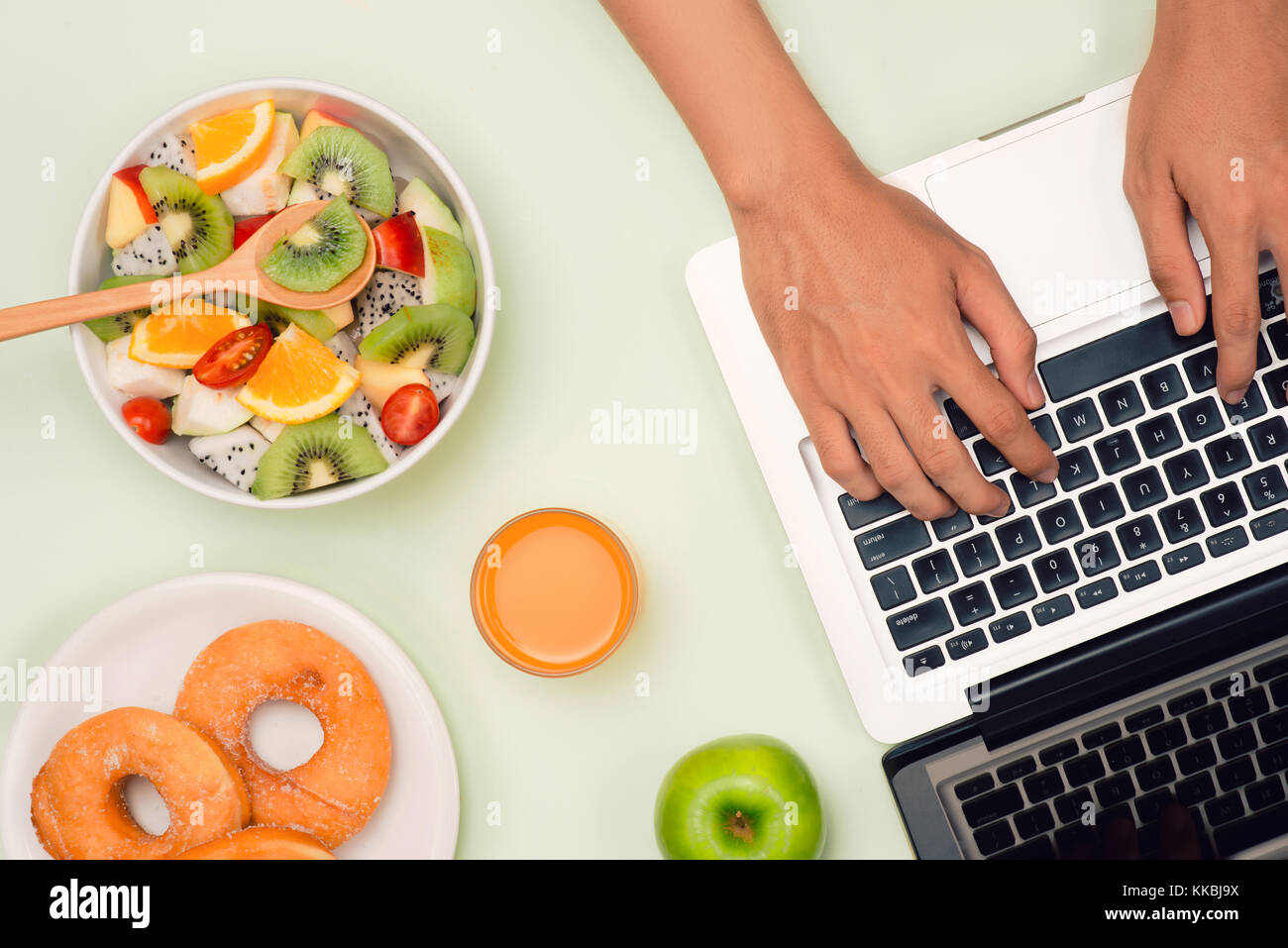 Eating delicious summer tropical fruits and breakfast Stock Photo - Alamy