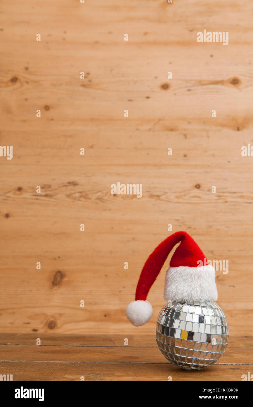 Christmas party background. Santa hat with disco mirrorball Stock Photo ...