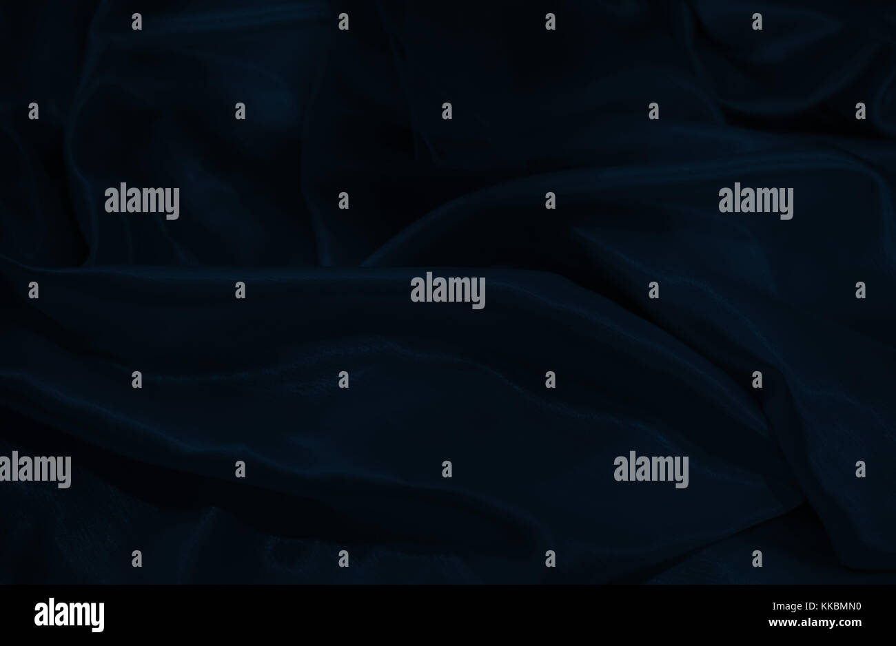 close up on dark blue silk material background or texture Stock Photo ...