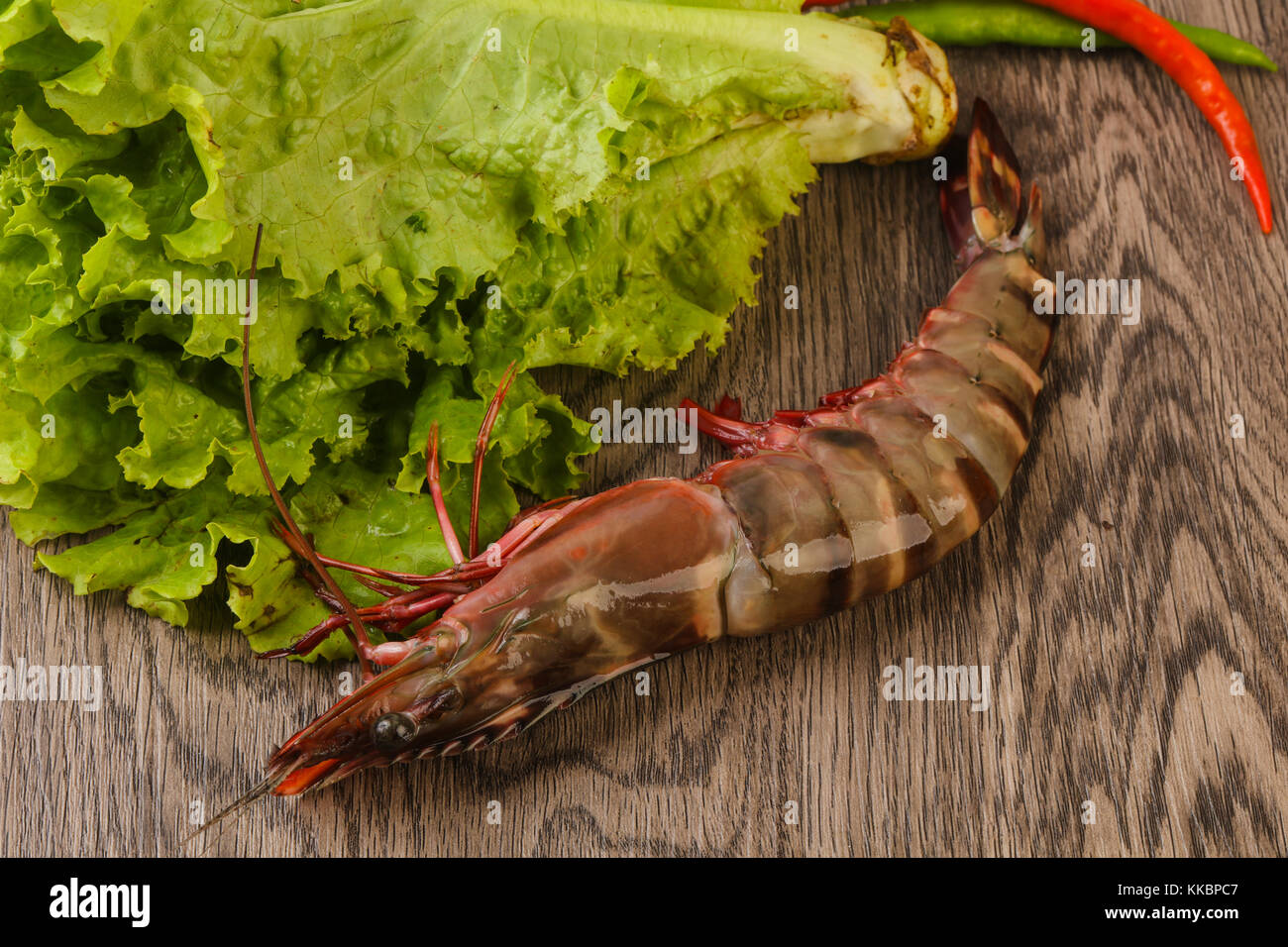 Raw big tiger prawn - ready for cooking Stock Photo - Alamy