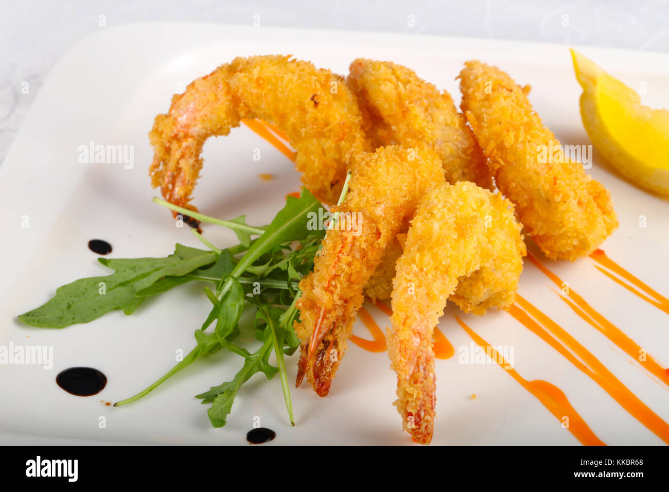 Crispy prawns served lemon slice Stock Photo - Alamy