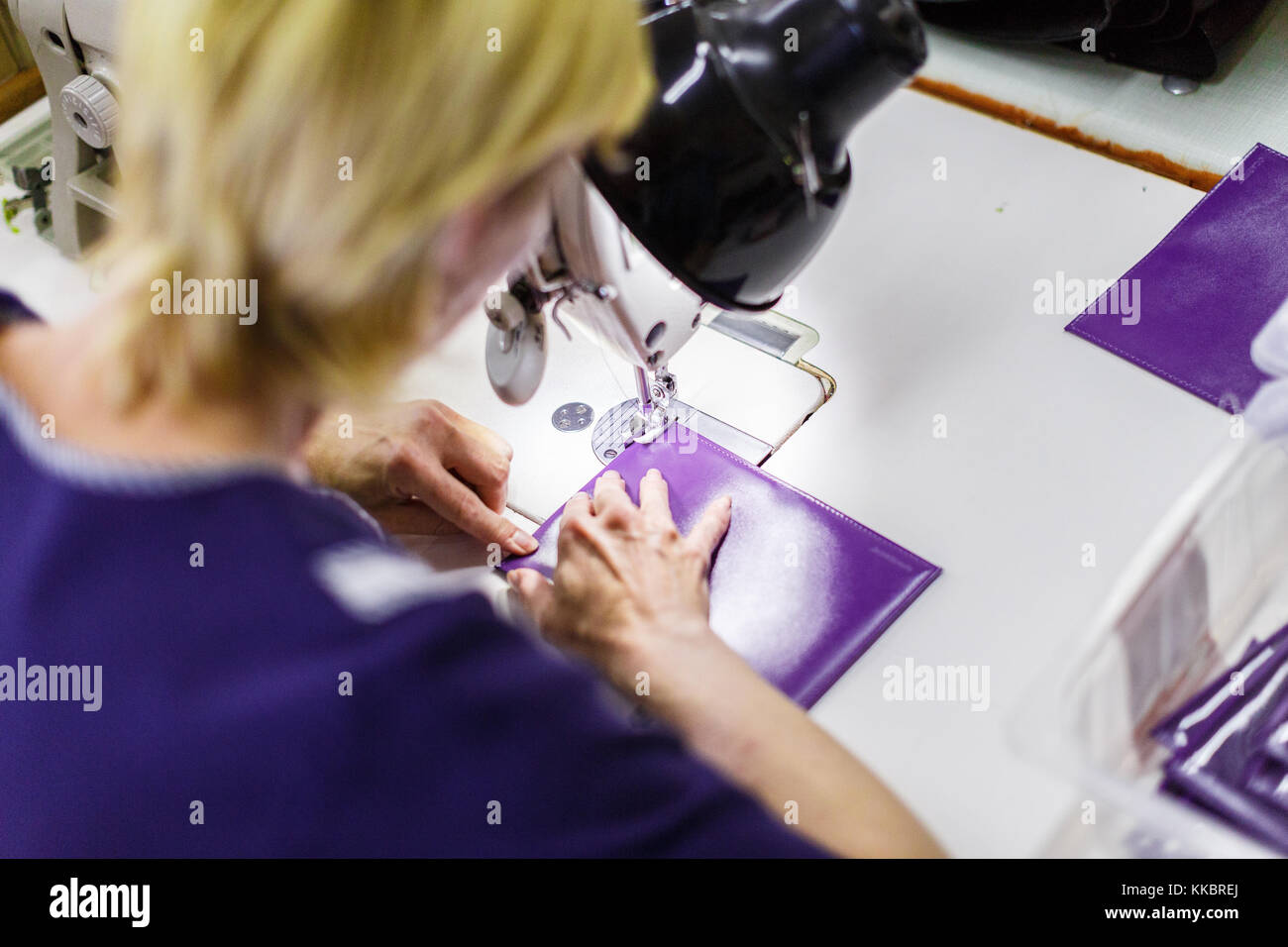 woman stitching a purse Stock Photo - Alamy