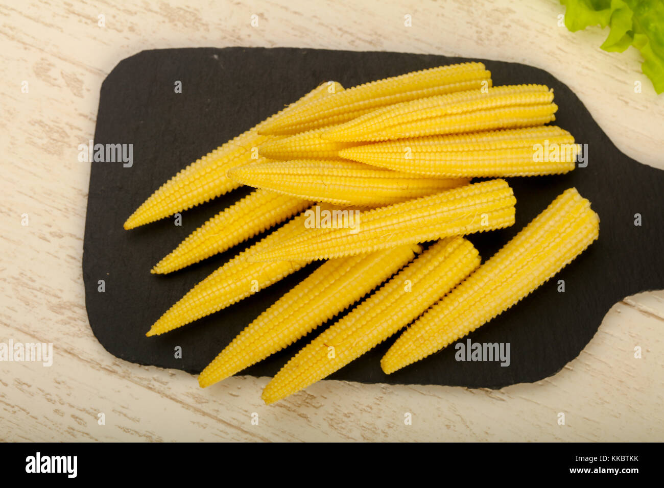 Young raw baby corn Stock Photo - Alamy