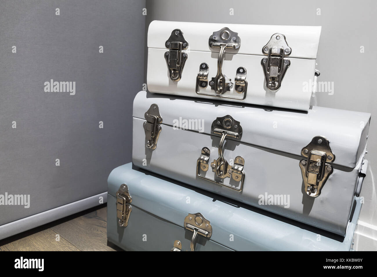 Decorative boxes with metal locks as an interior decoration stand in a ...