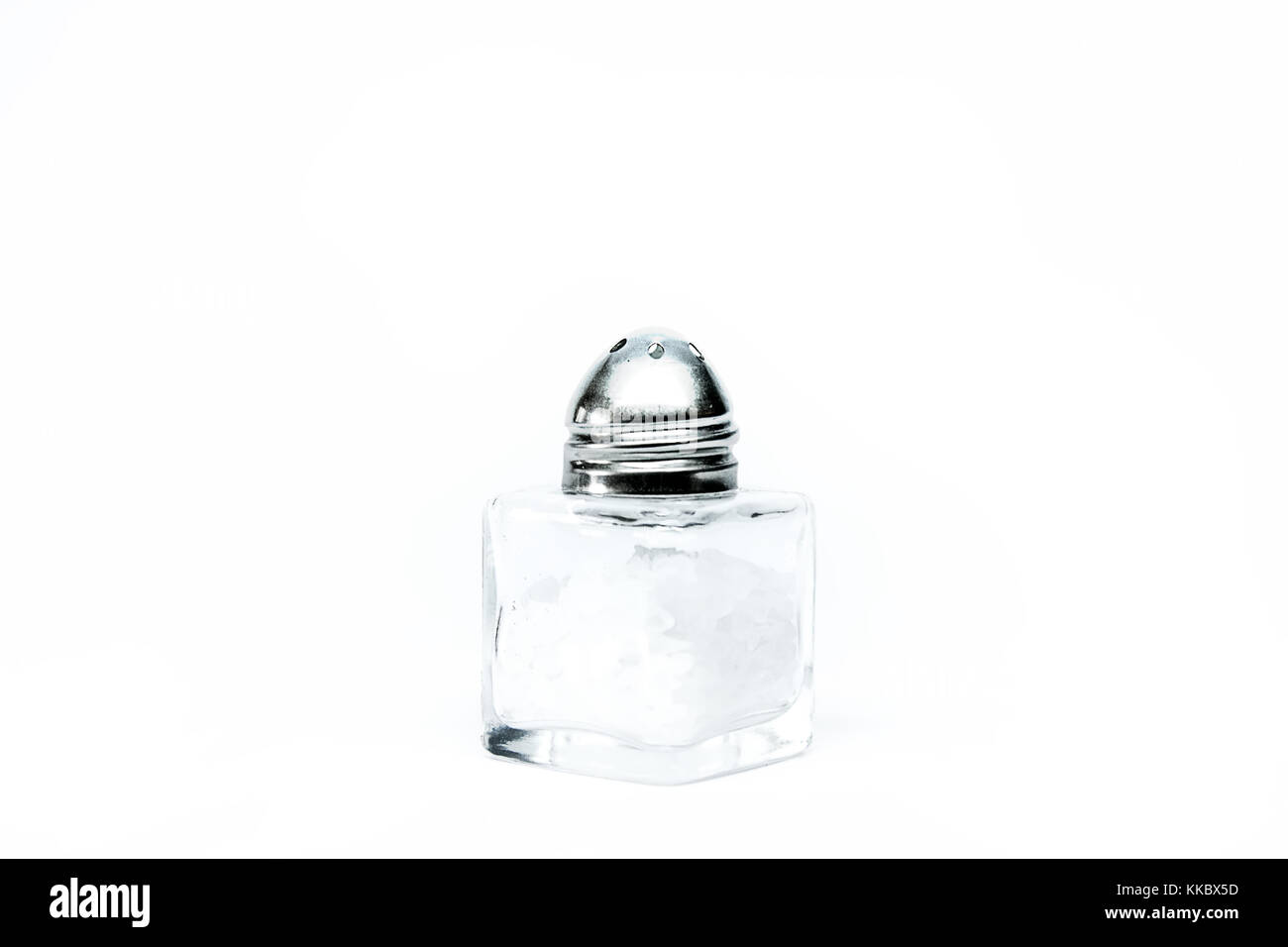 Sea salt on white isolated background Stock Photo - Alamy