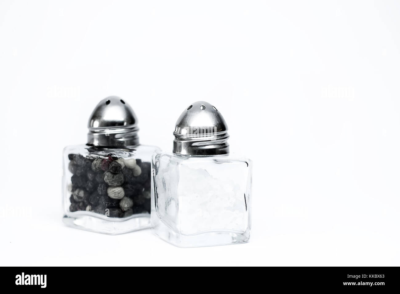 Sea salt on white isolated background Stock Photo - Alamy