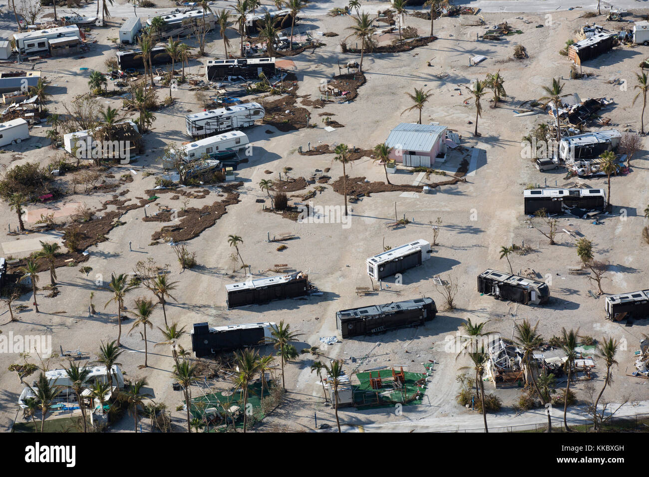 Aerial view of damaged RVs and trailers strewn around a trailer park in ...