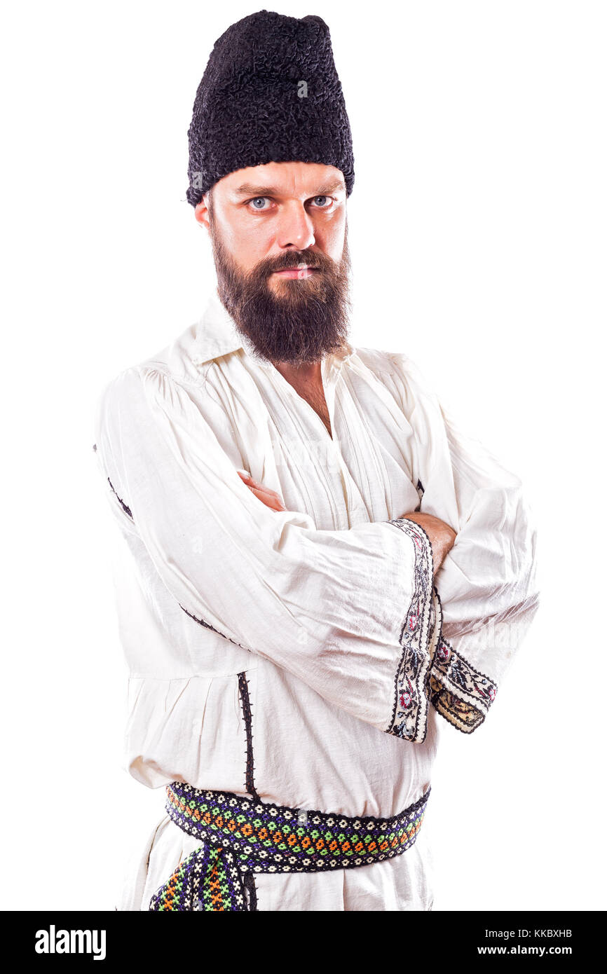 young man wearing traditional romanian costume on white background ...