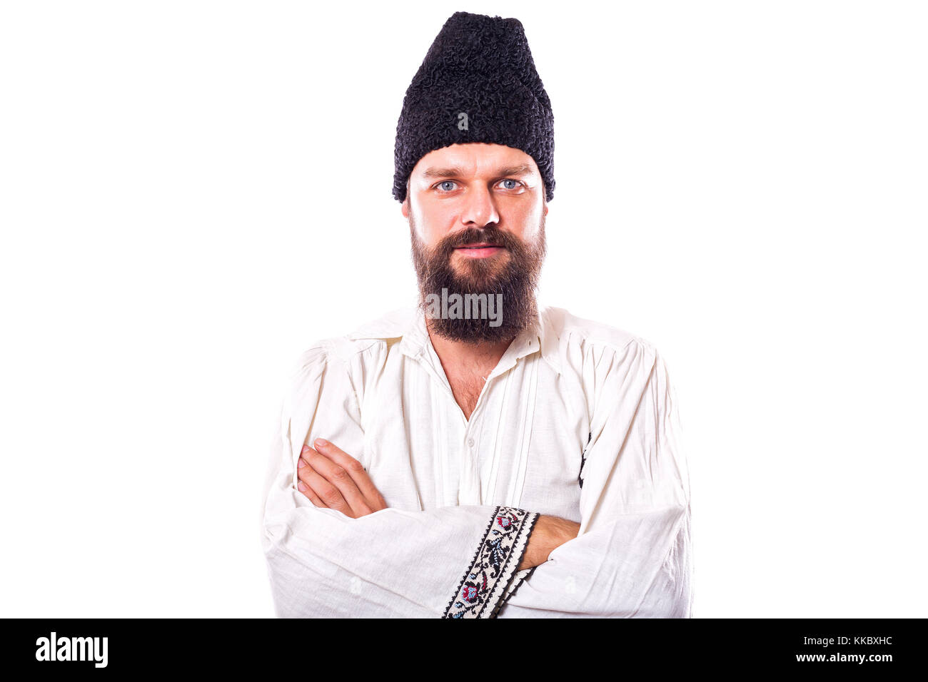 young man wearing traditional romanian costume on white background ...