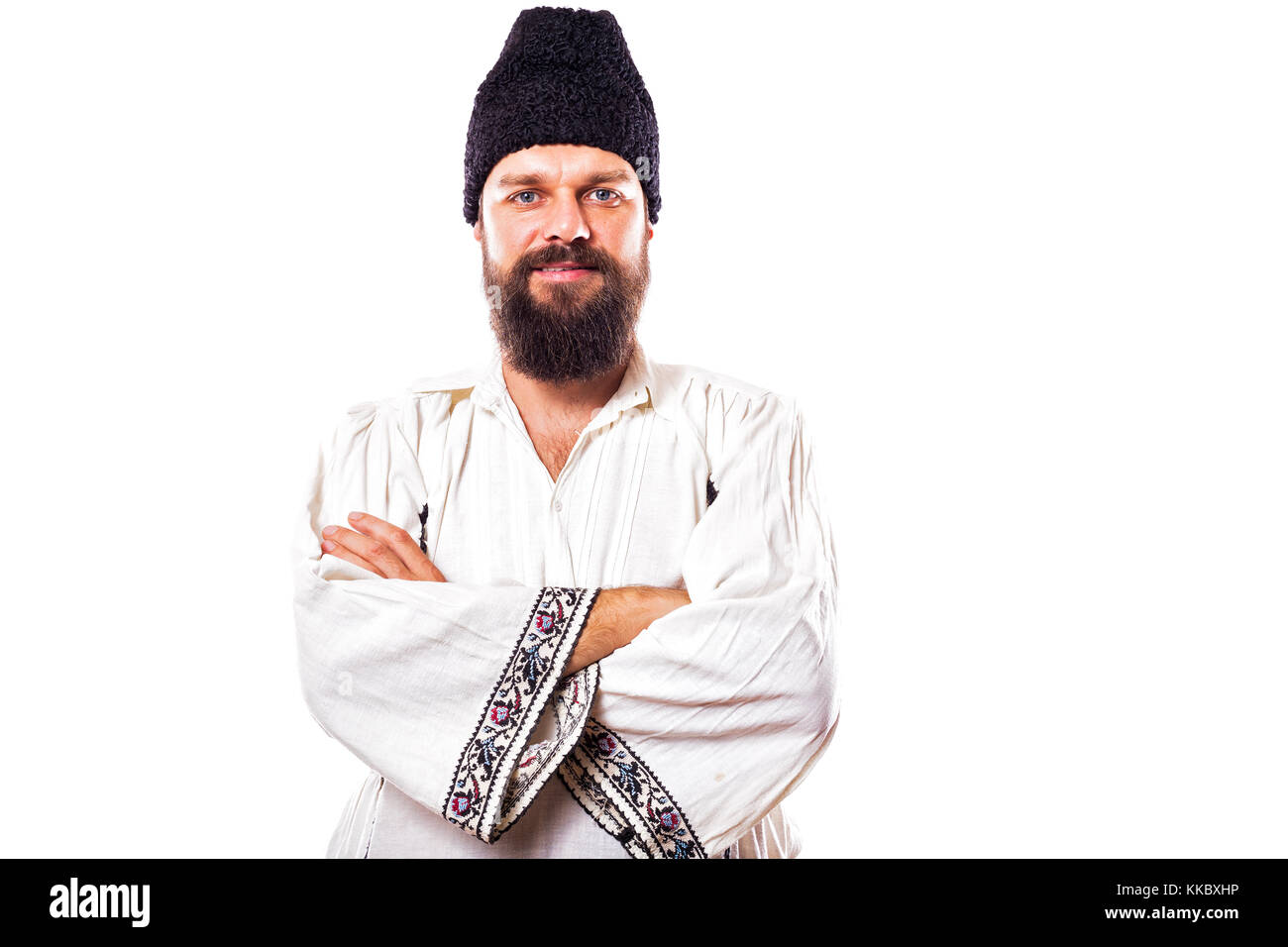 young man wearing traditional romanian costume on white background ...