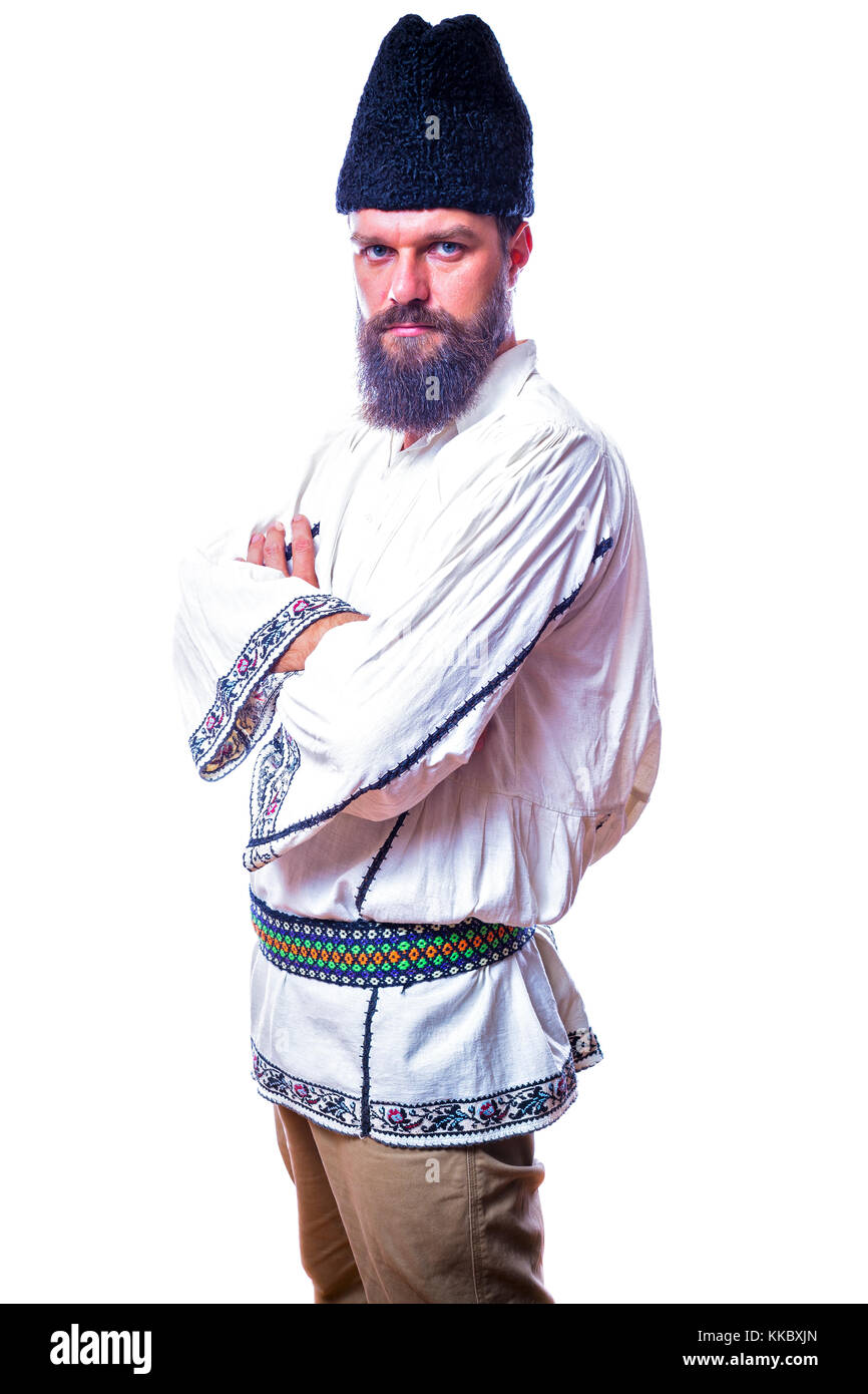young man wearing traditional romanian costume on white background ...