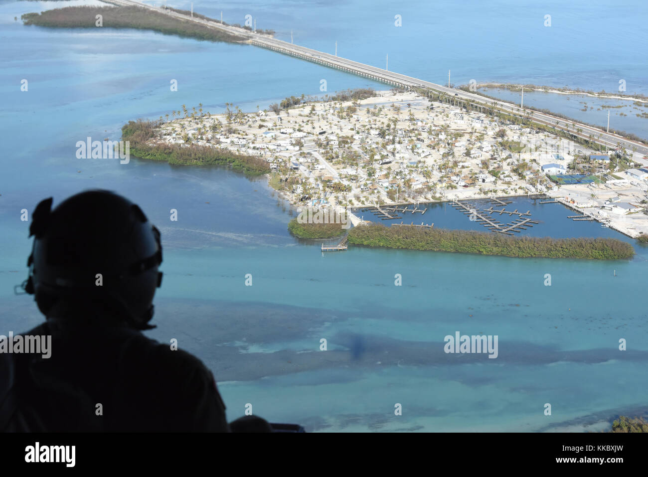 A U.S. National Guard soldier surveys the damage caused by Hurricane ...