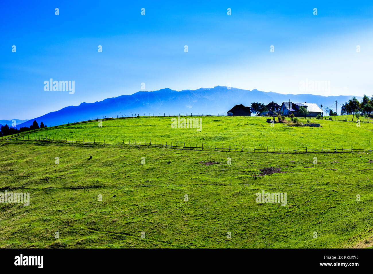 Landscape with village houses on mountains Stock Photo - Alamy