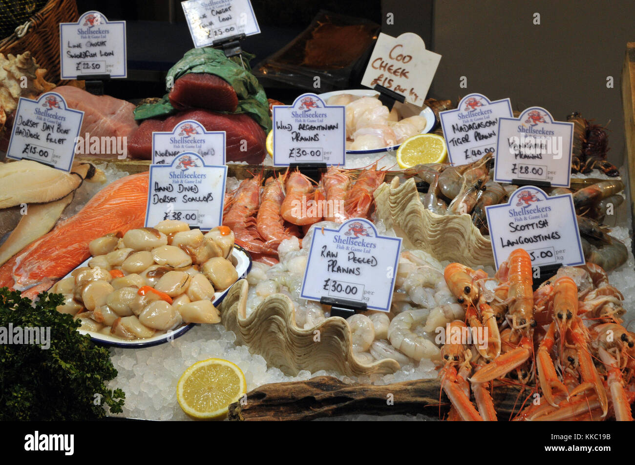 A selection of beautiful fresh wet fish in a colourful display on a ...