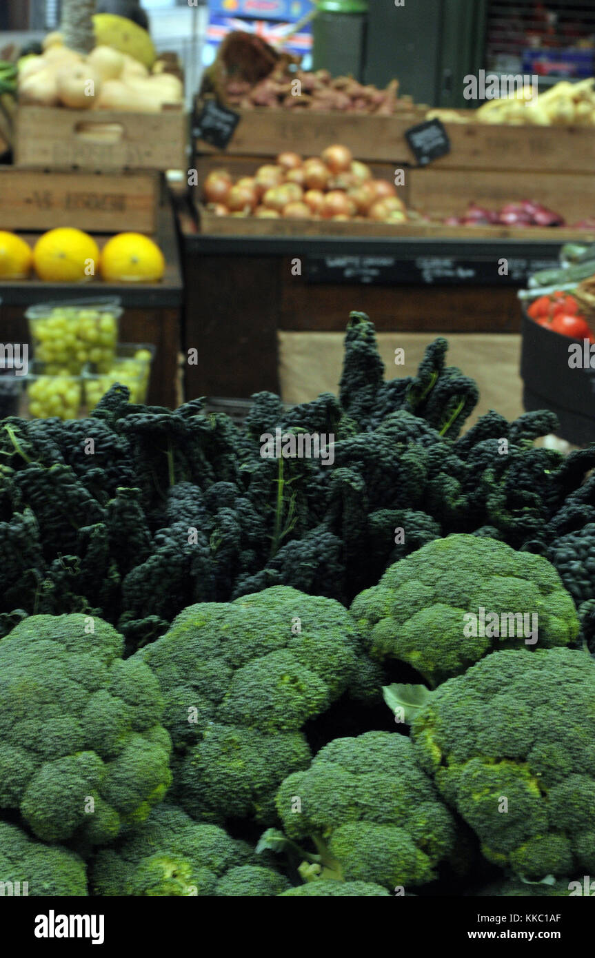 Broccoli and other fresh green vegetables and fresh fruits for sale on ...