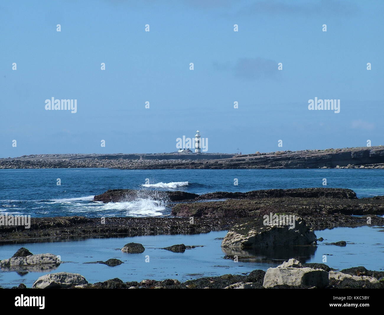 Lighthouse on the coast of Inis Mor Island, Aran Islands, Ireland Stock ...