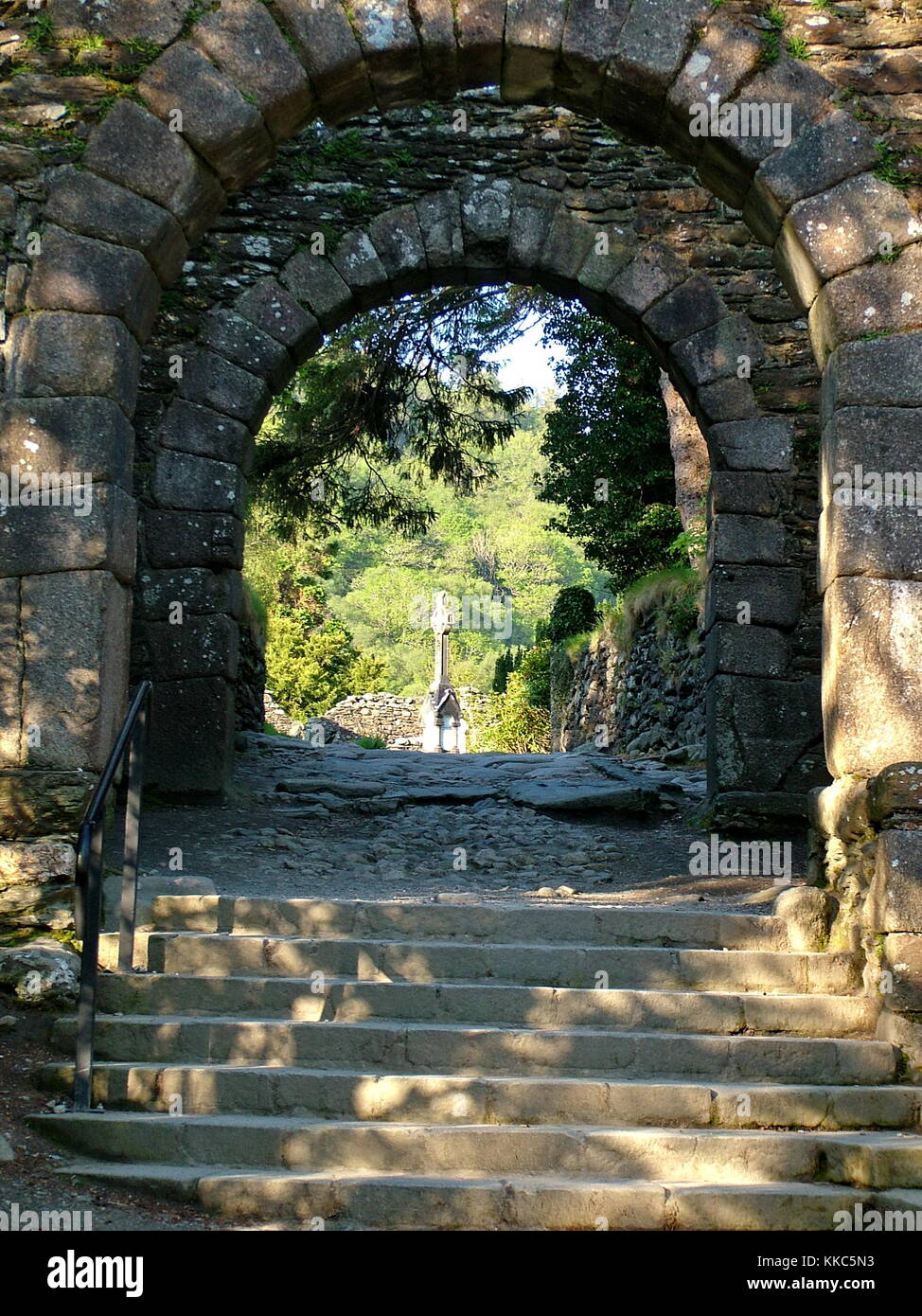 Stone entrance gate to Glendalough Monastic Site in Wicklow Mountains ...