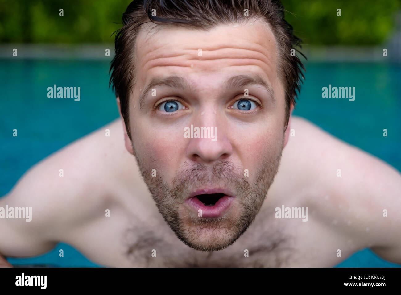 Man is shocked with news. He is closing his mouth. He is swimming in ...