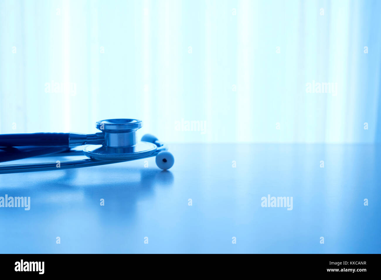 Stethoscope on table Stock Photo - Alamy