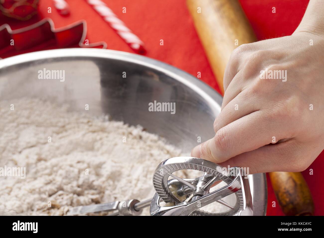human mixing flour bowl Stock Photo - Alamy
