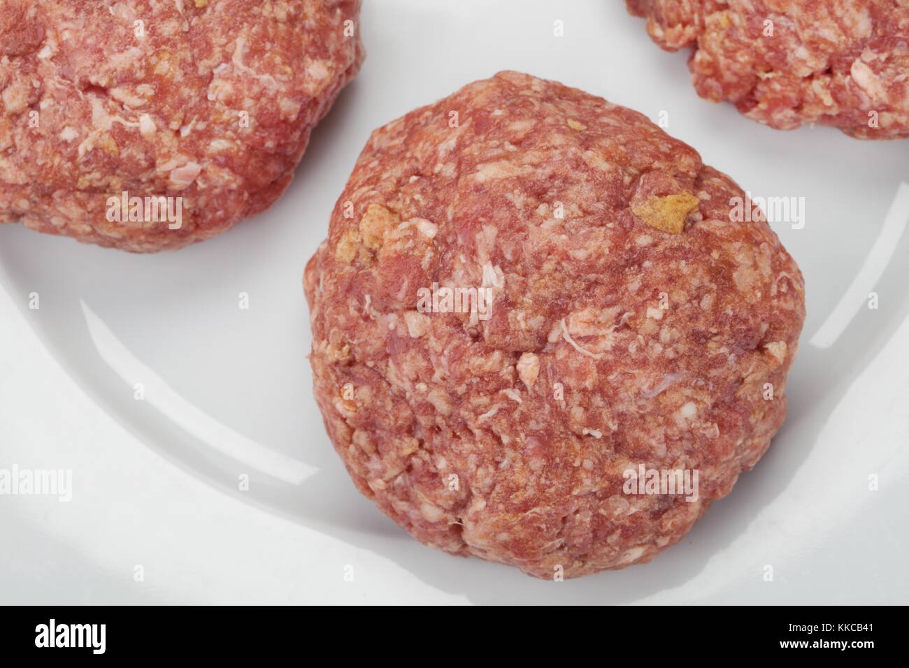 Raw uncooked beef burger beefburger meat red hi-res stock photography ...