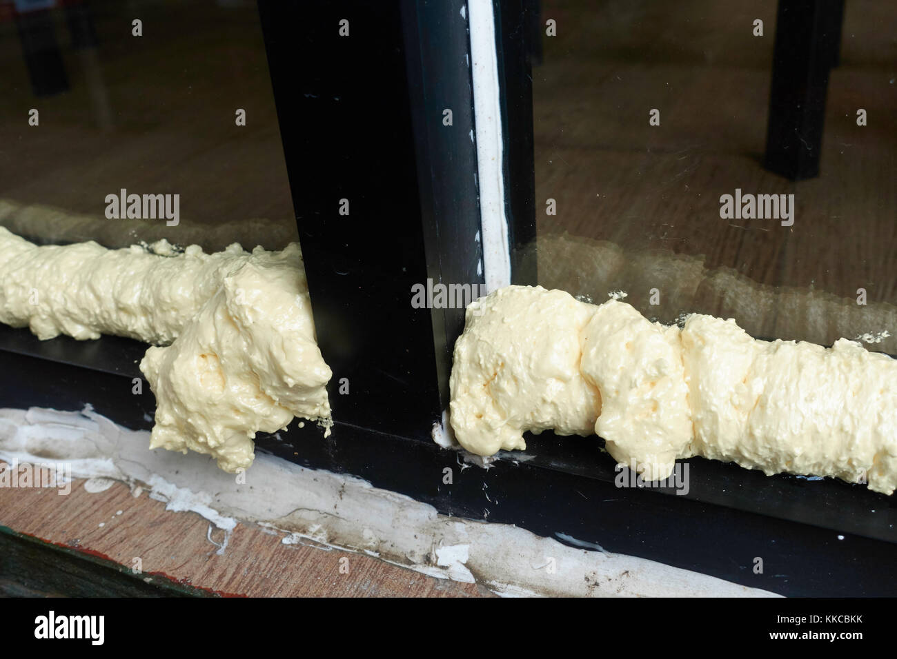 Close-up of Polyurethane foam fills in gap at window Stock Photo - Alamy