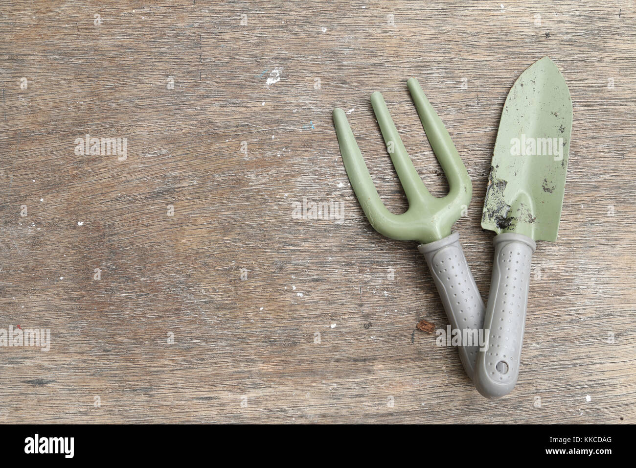 Garden tools on wooden table Stock Photo - Alamy