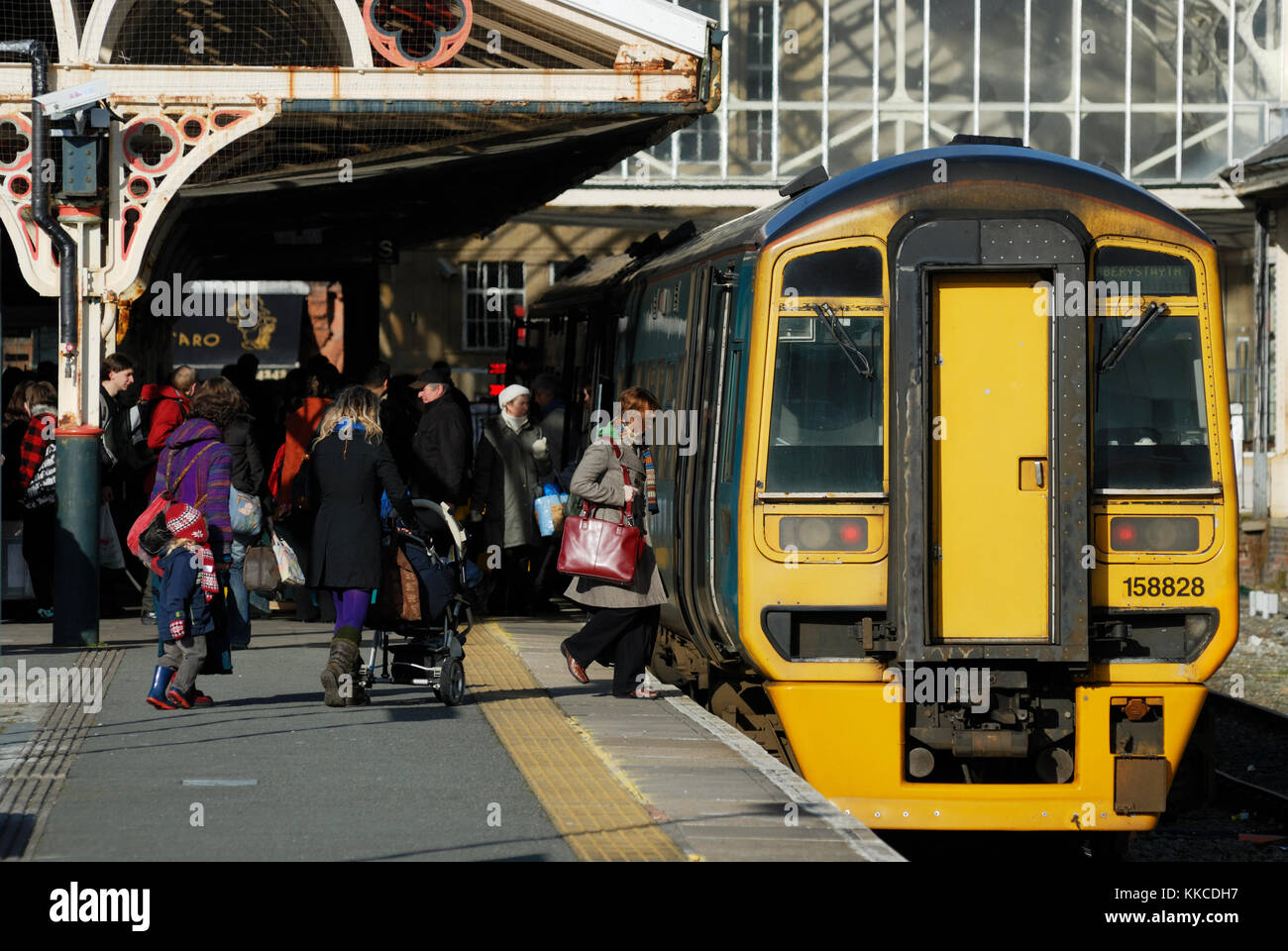 People boarding a train at Aberystwyth railway station, Wales, UK Stock ...