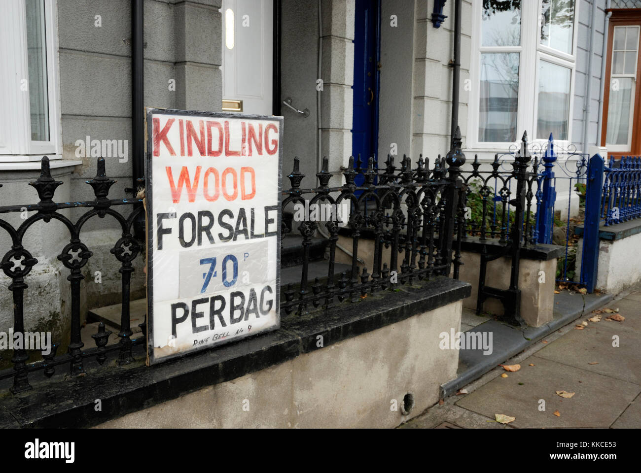 Sign advertising kindling wood for sale on a residential property ...