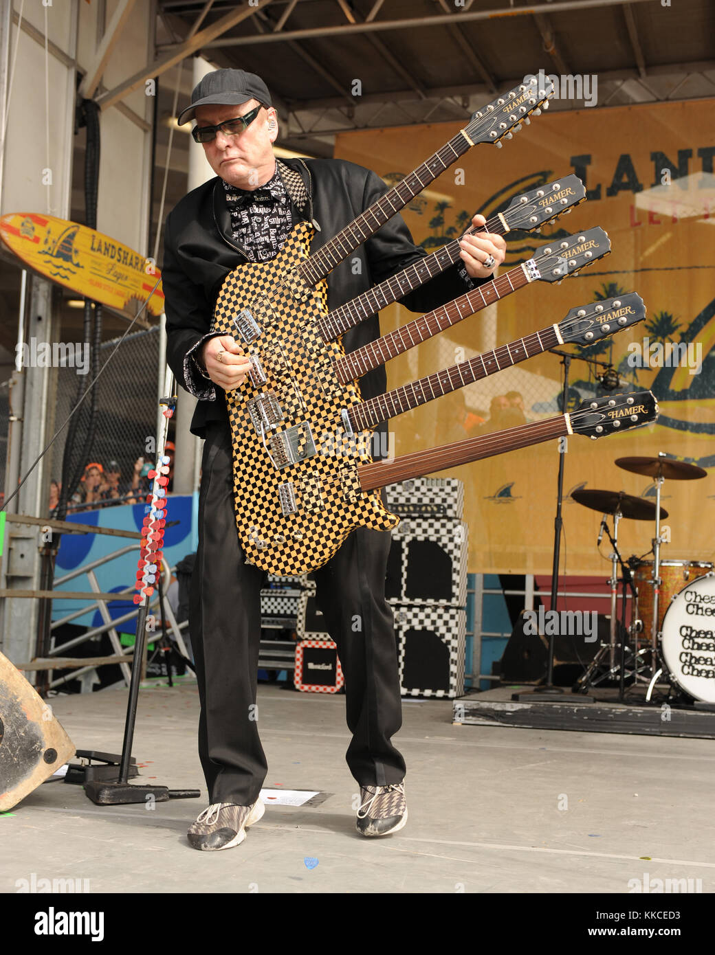 MIAMI, FL - DECEMBER 27: Rick Nielsen of Cheap Trick poses backstage at ...