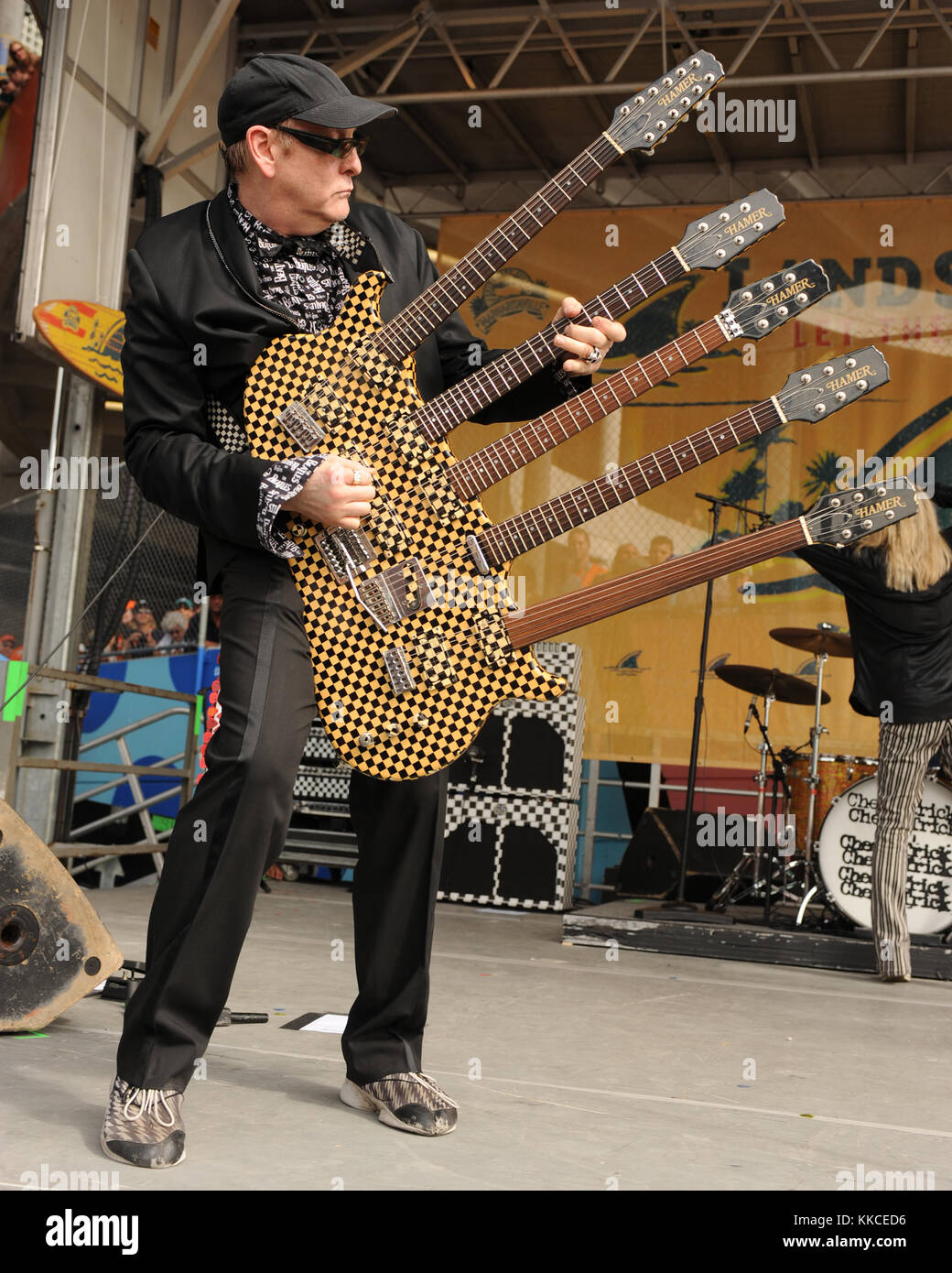 MIAMI, FL - DECEMBER 27: Rick Nielsen of Cheap Trick poses backstage at ...