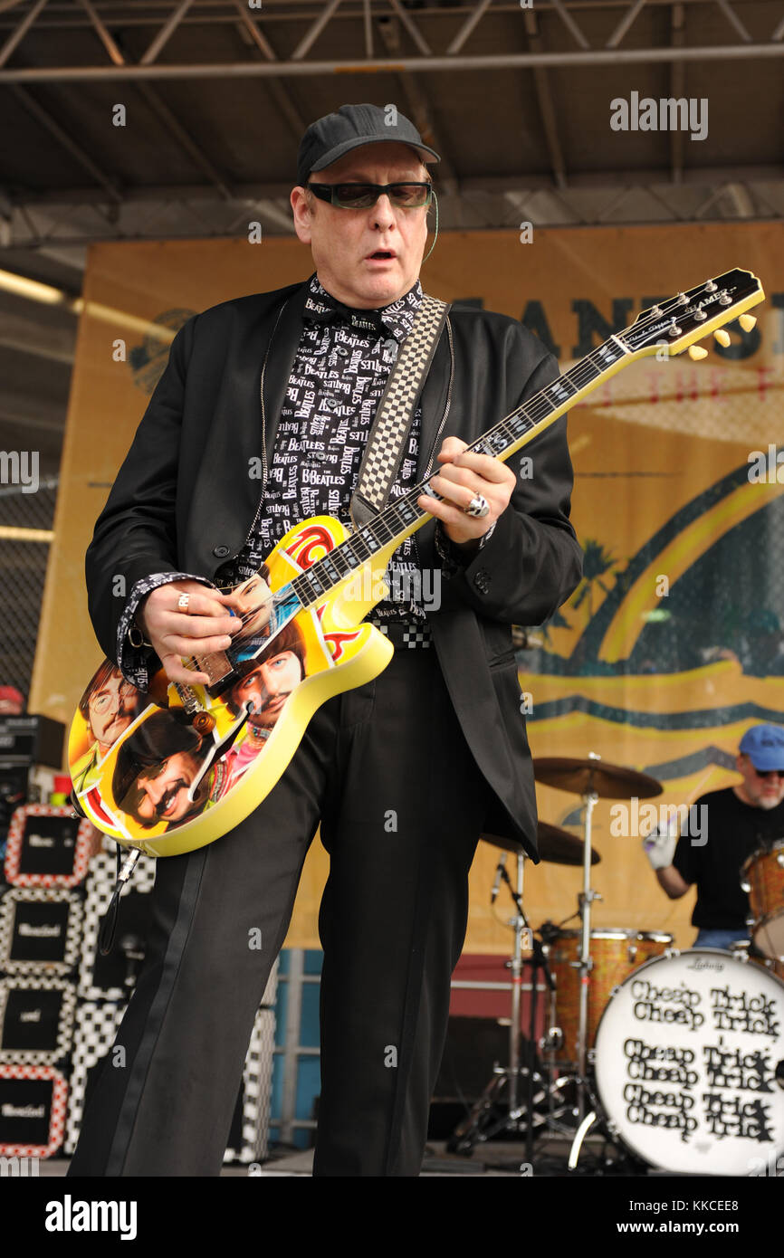 MIAMI, FL - DECEMBER 27: Rick Nielsen of Cheap Trick poses backstage at ...