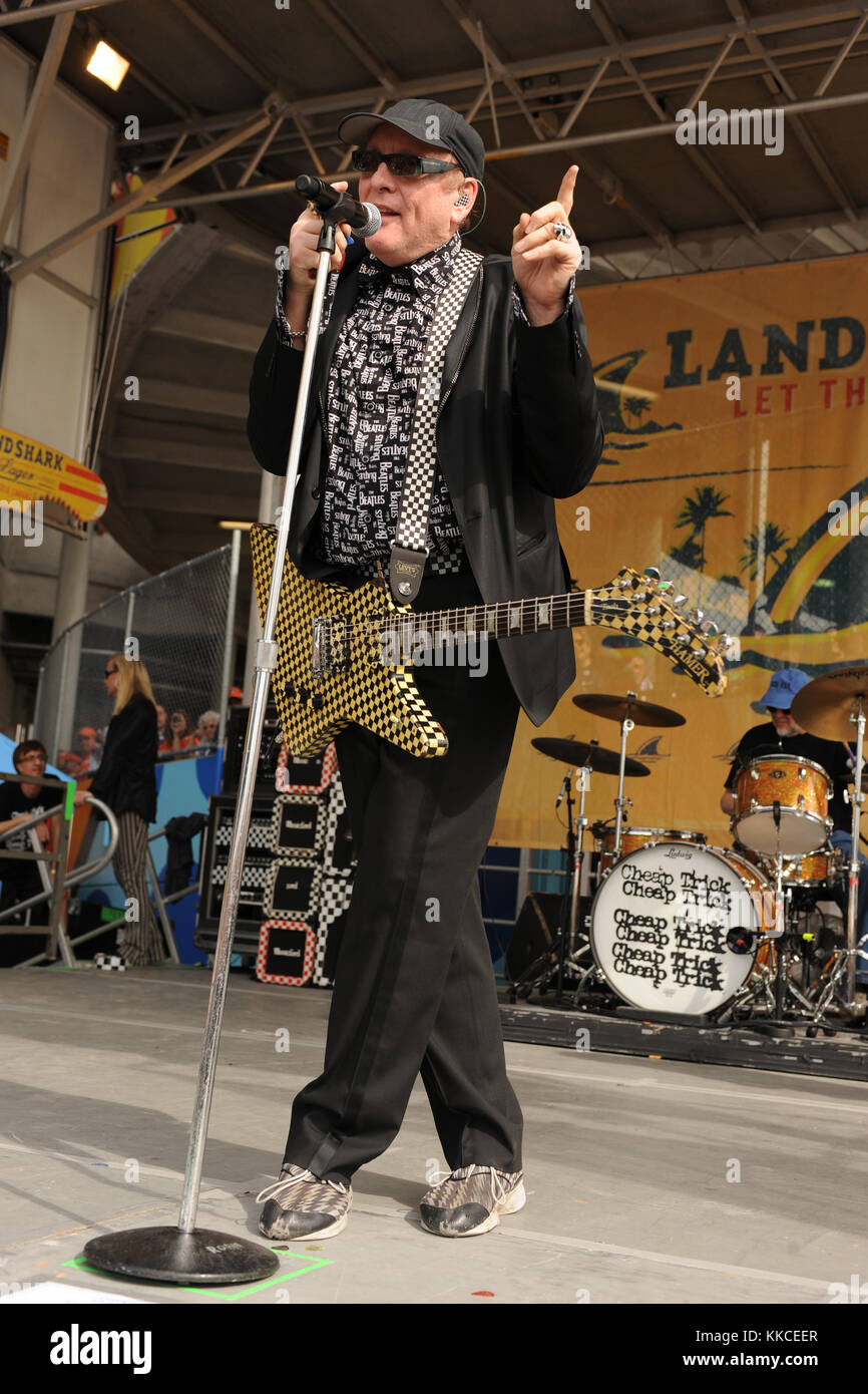 MIAMI, FL - DECEMBER 27: Rick Nielsen of Cheap Trick poses backstage at ...