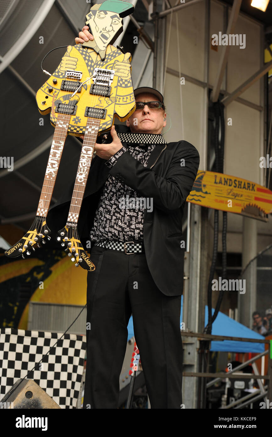 MIAMI, FL - DECEMBER 27: Rick Nielsen of Cheap Trick poses backstage at ...