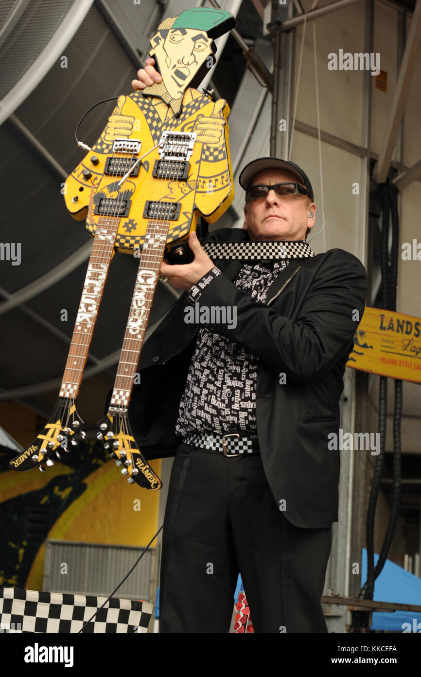 MIAMI, FL - DECEMBER 27: Rick Nielsen of Cheap Trick poses backstage at ...