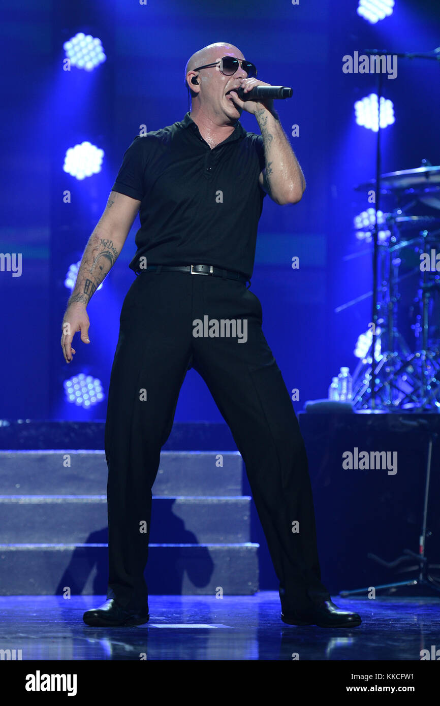 MIAMI, FL - NOVEMBER 07: Pitbull performs onstage at iHeartRadio Fiesta ...